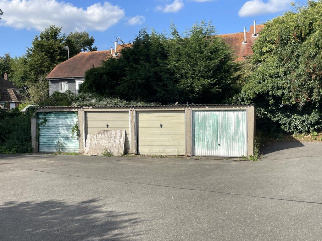 LOT - 64 AUCTION - 246 - LAND AND TWELVE GARAGES